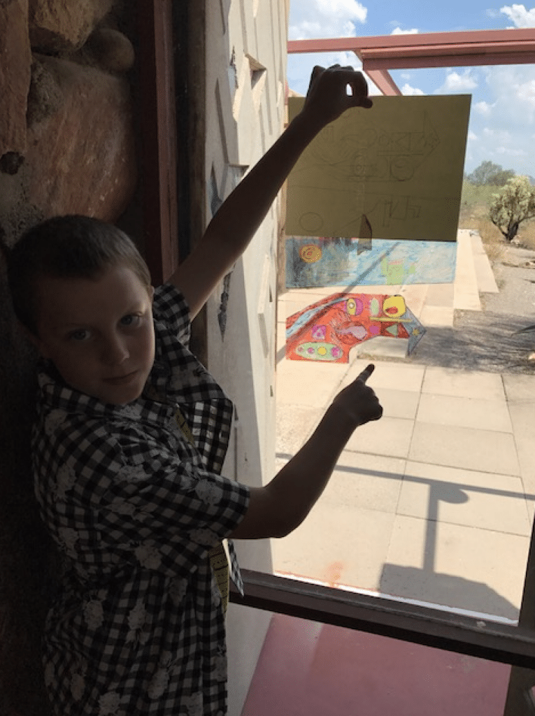 boy with stained glass project - Frank Lloyd Wright Foundation